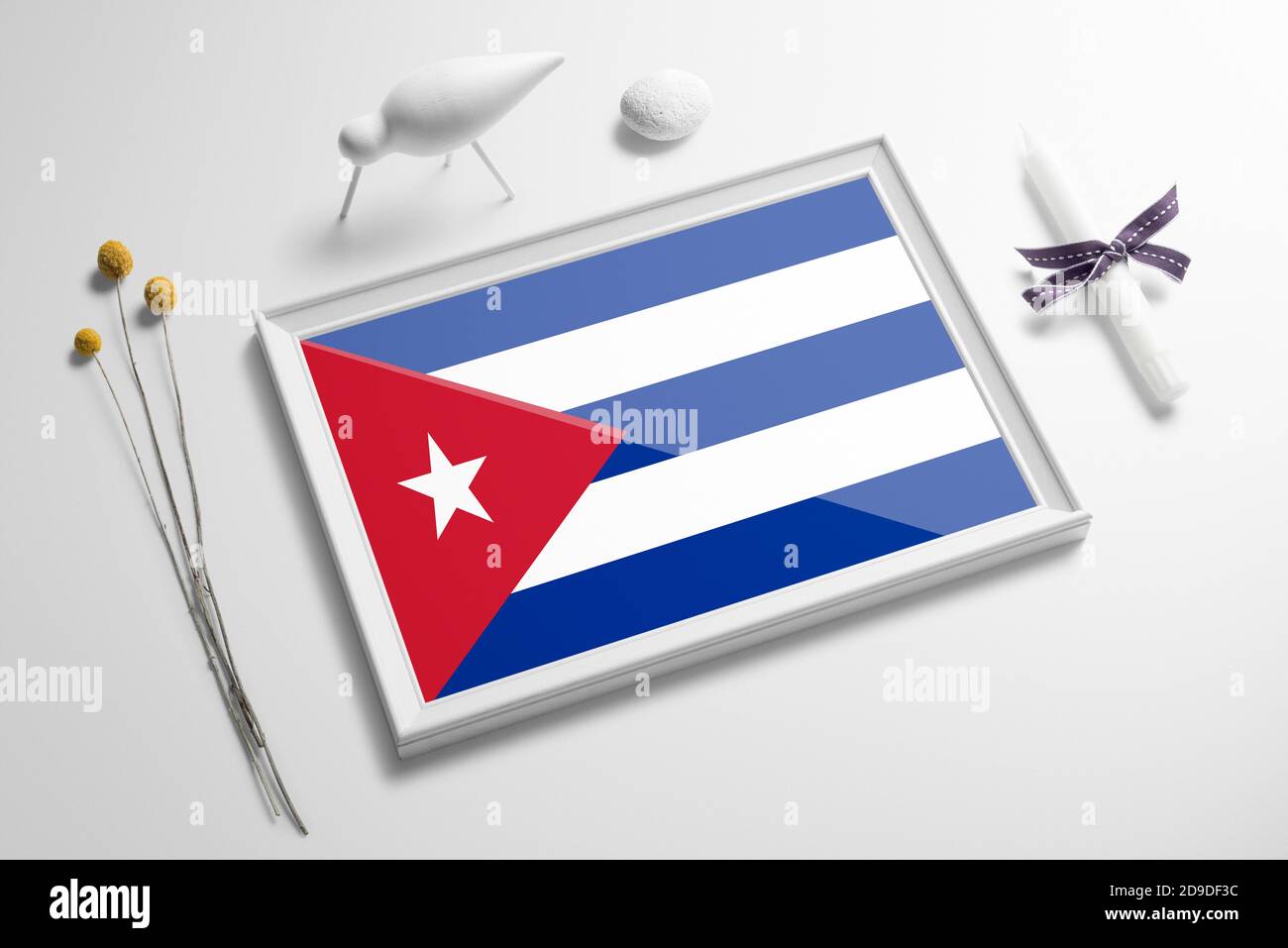 Cuba flag in wooden frame on table. White natural soft concept ...
