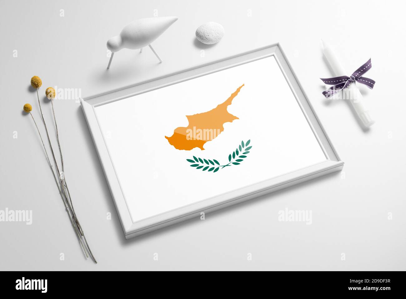 Cyprus flag in wooden frame on table. White natural soft concept ...