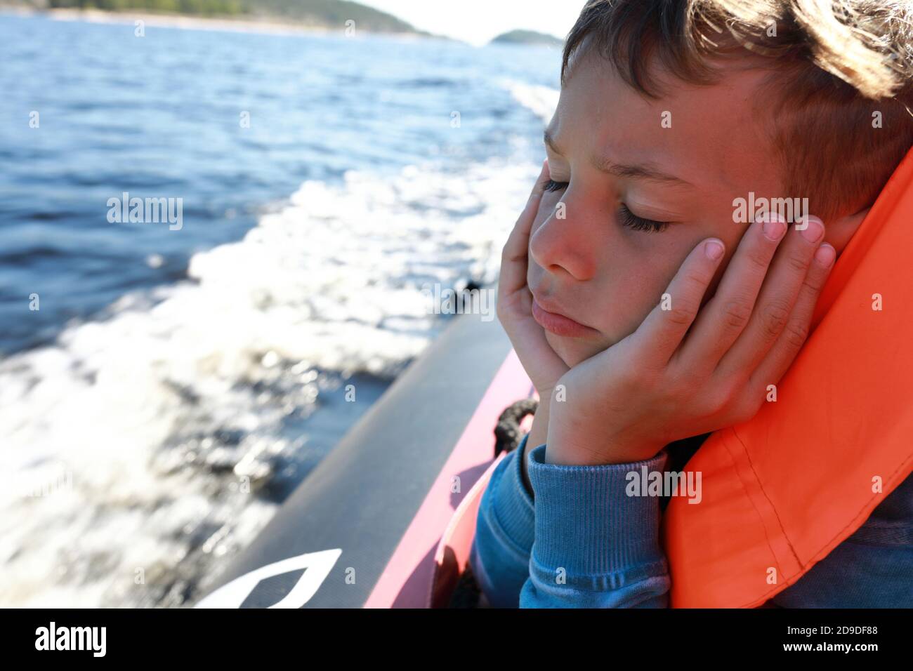 Boy life vest floating hi-res stock photography and images - Alamy