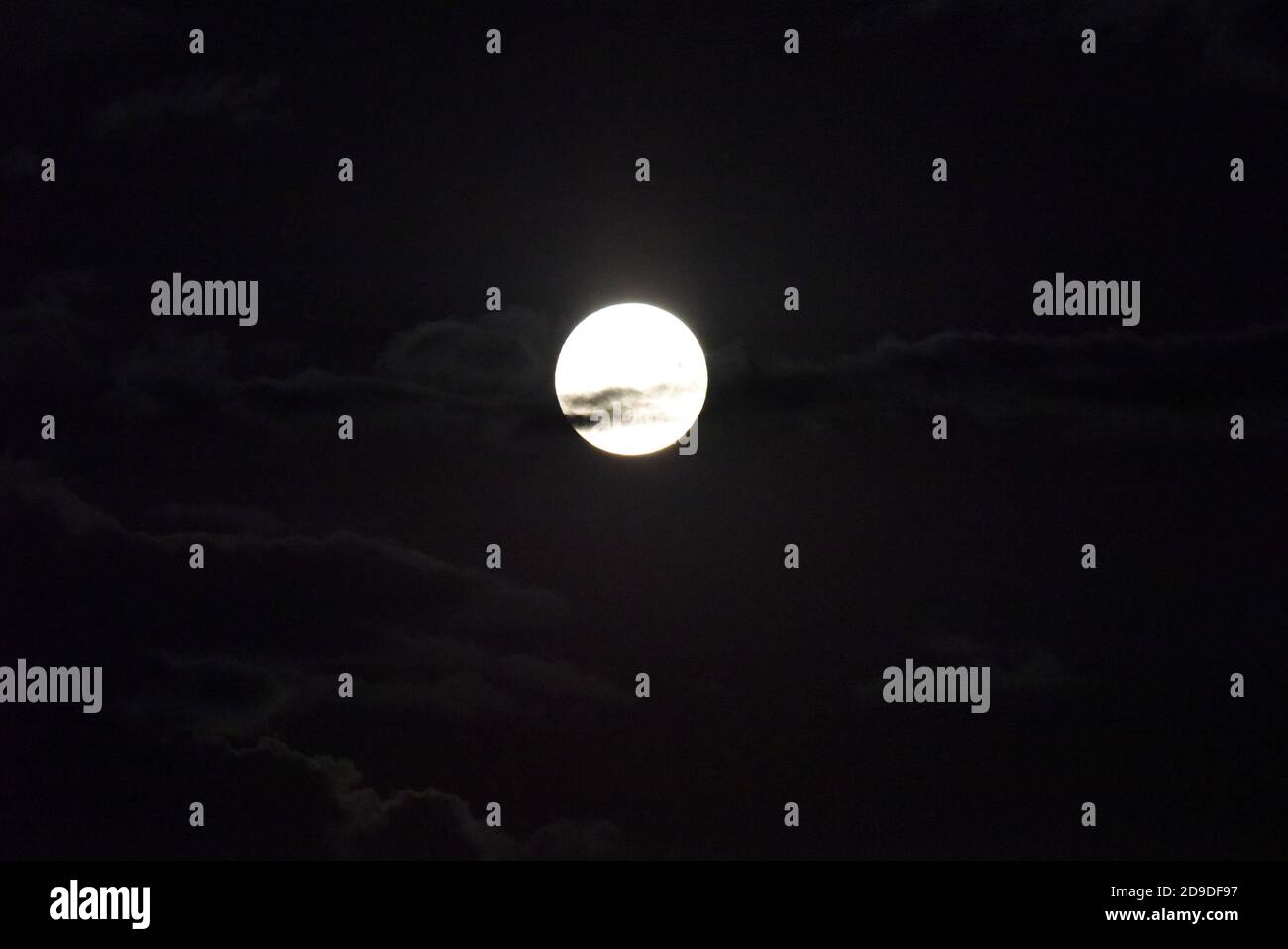 A full moon is seen above traditional Chinese-style building at Mid ...