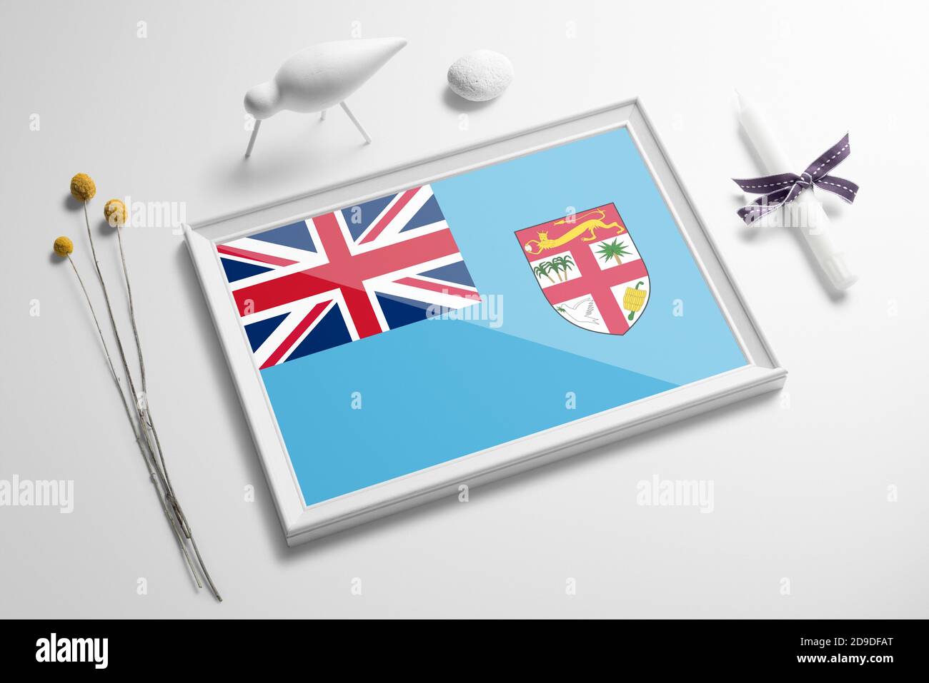 Fiji flag in wooden frame on table. White natural soft concept ...