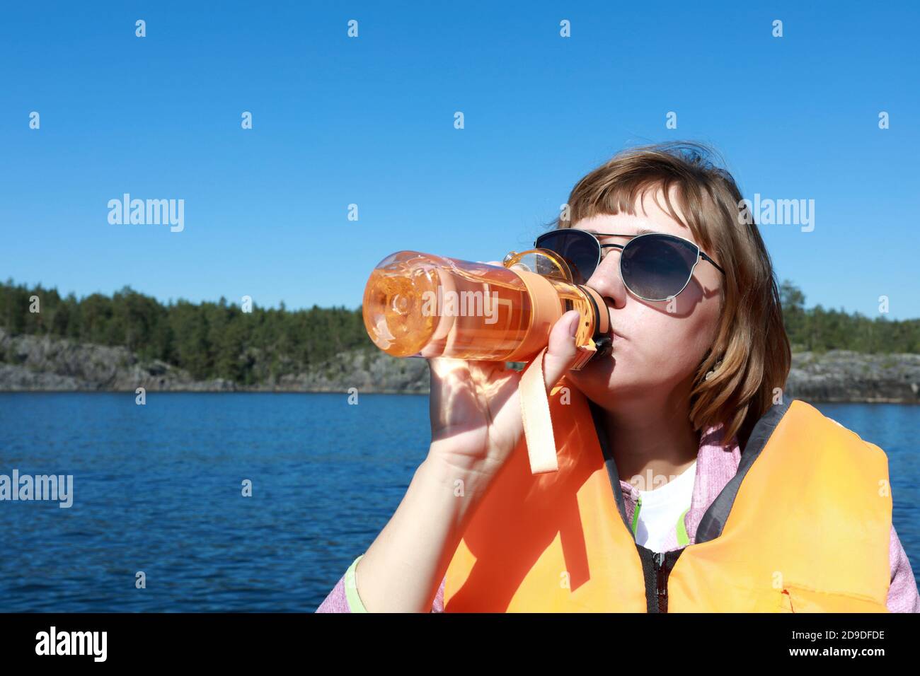Safety vest and water drinking hi-res stock photography and images - Alamy