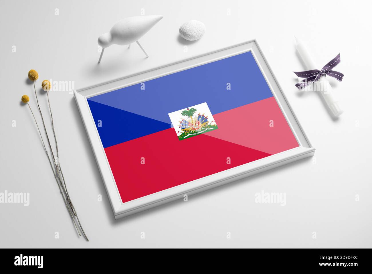Haiti flag in wooden frame on table. White natural soft concept ...