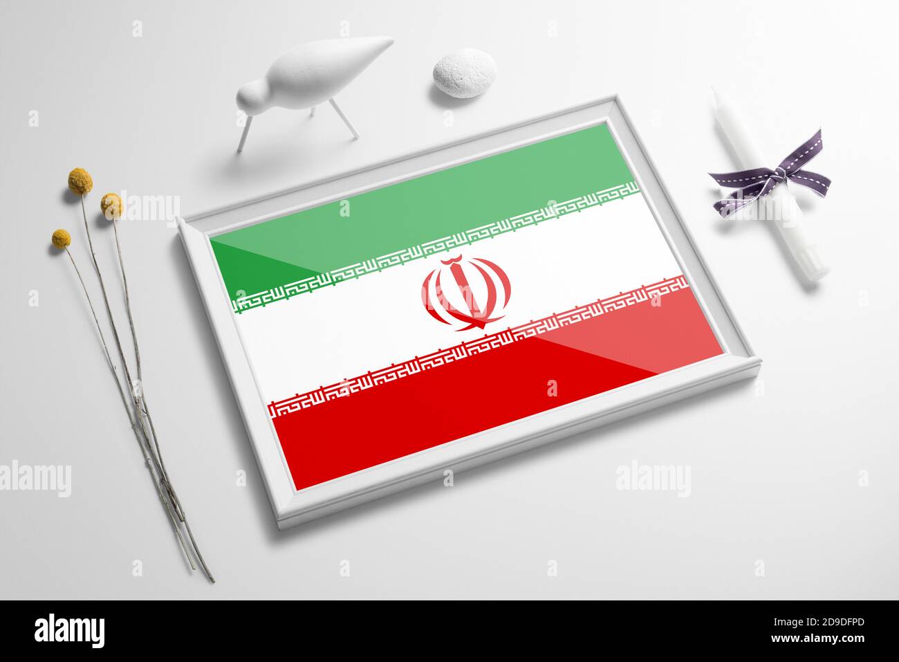 Iran flag in wooden frame on table. White natural soft concept ...