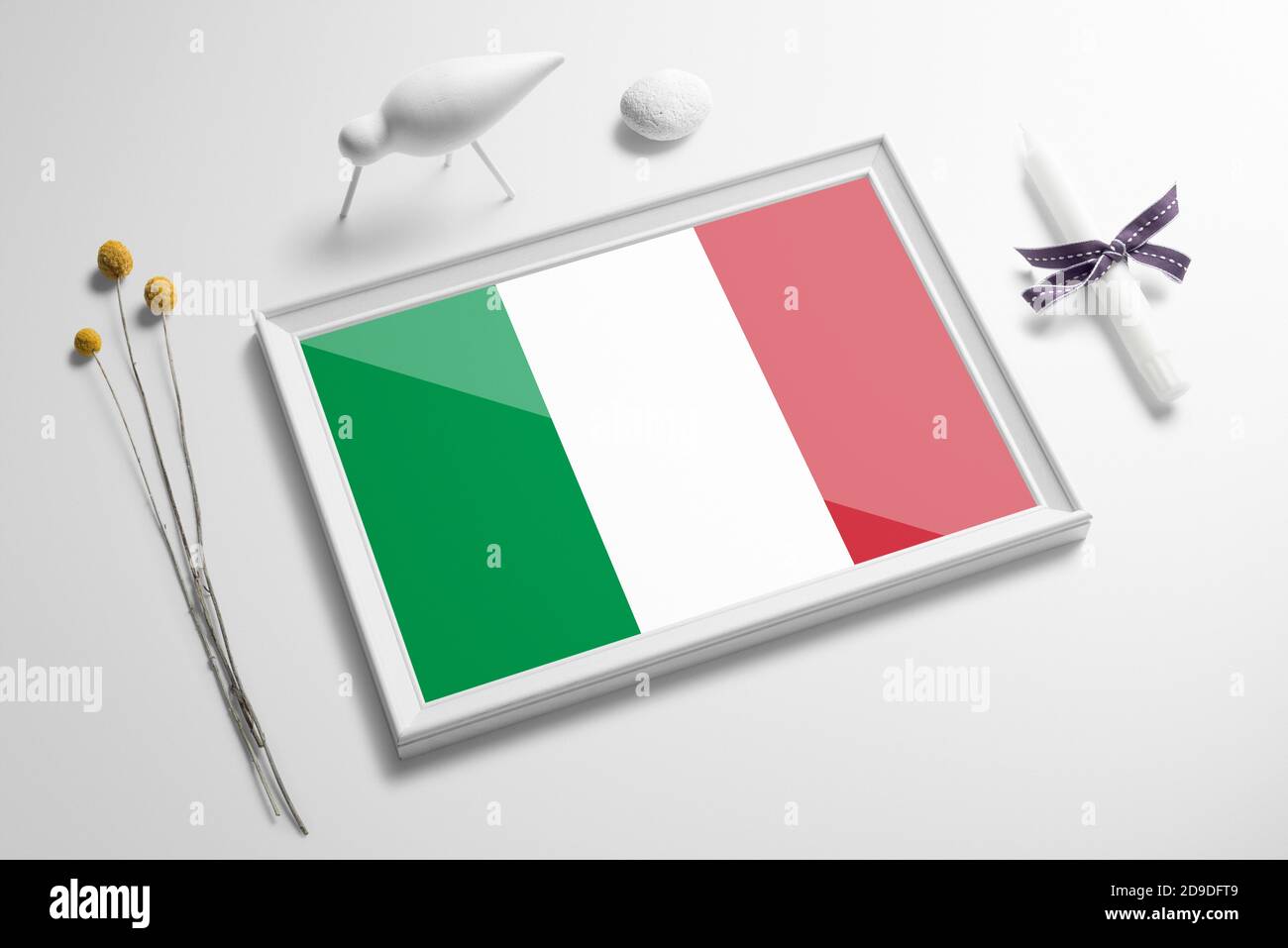 Italy flag in wooden frame on table. White natural soft concept ...