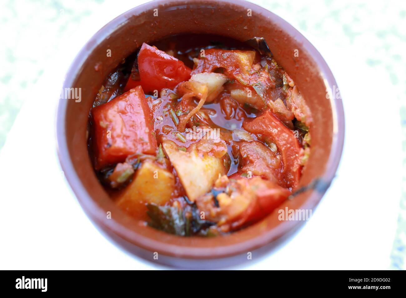 Bowl with Ajapsandali dish, georgian eggplant stew Stock Photo - Alamy
