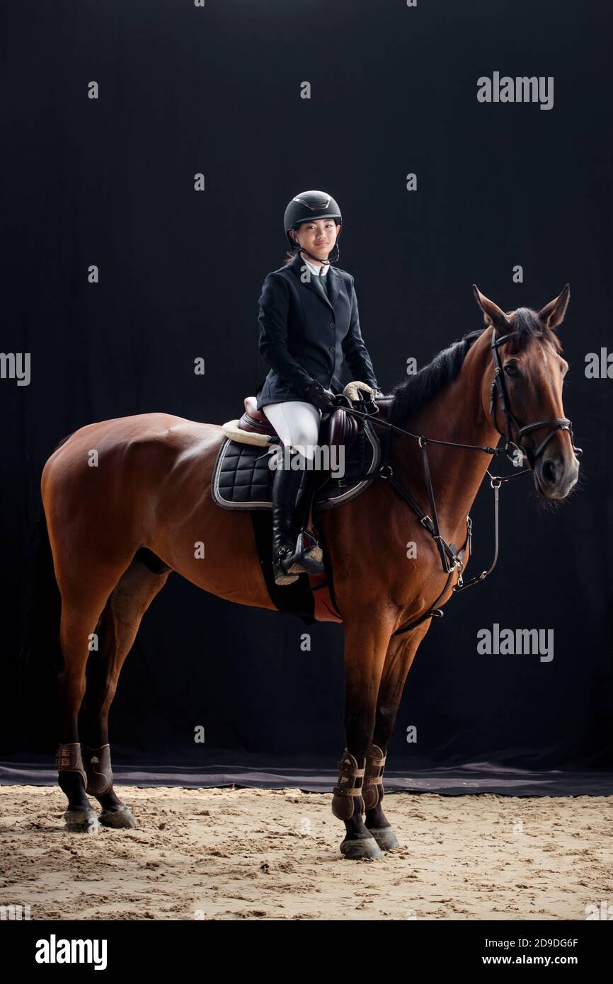 Handsome youth portrait on horseback Stock Photo - Alamy