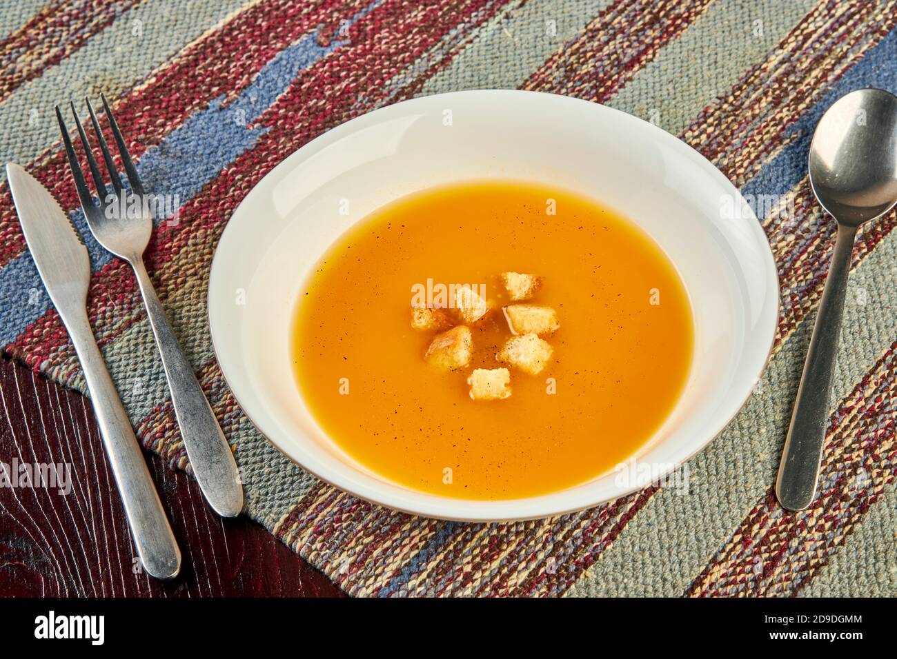 Soup puree with vegetables in a white bowl close up Stock Photo - Alamy