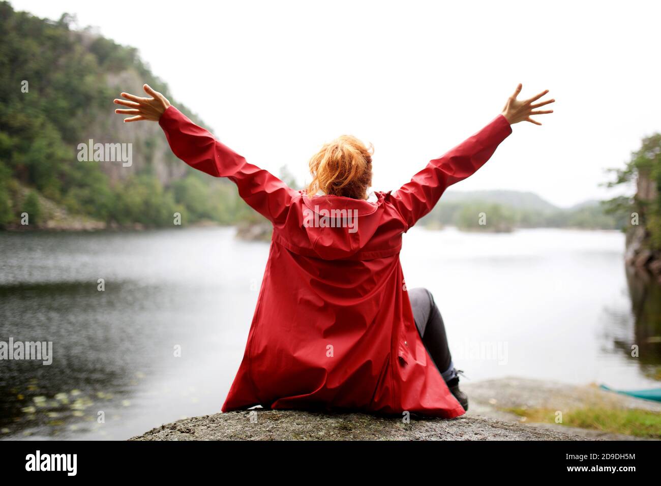 Red rain jacket hi-res stock photography and images - Alamy