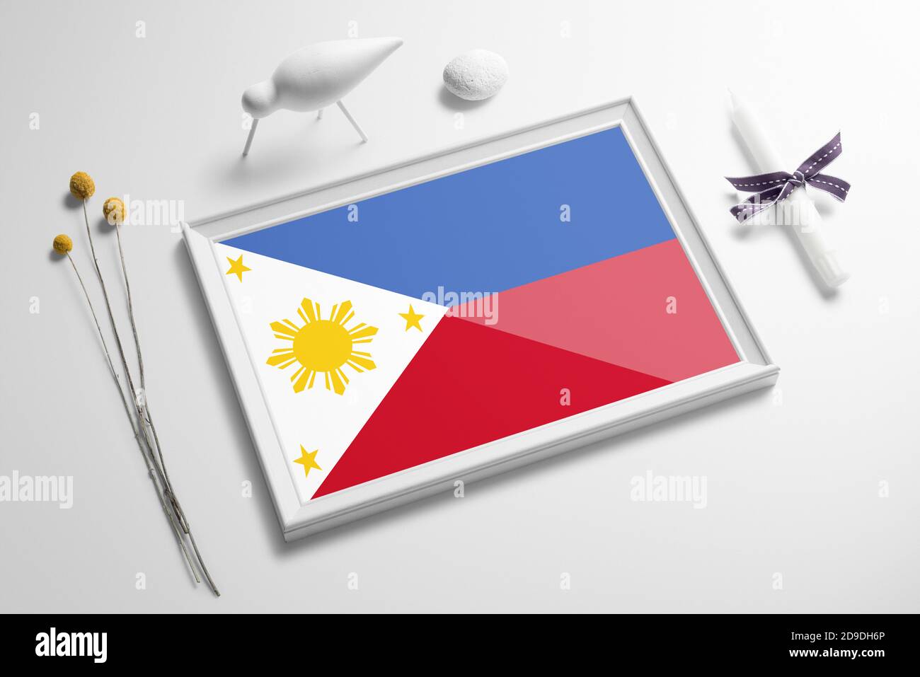 Philippines flag in wooden frame on table. White natural soft concept ...