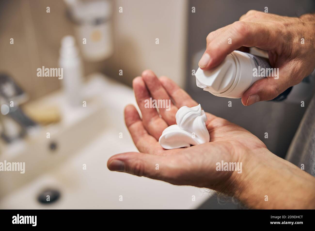 Fragment photo of person getting some shaving cream Stock Photo - Alamy