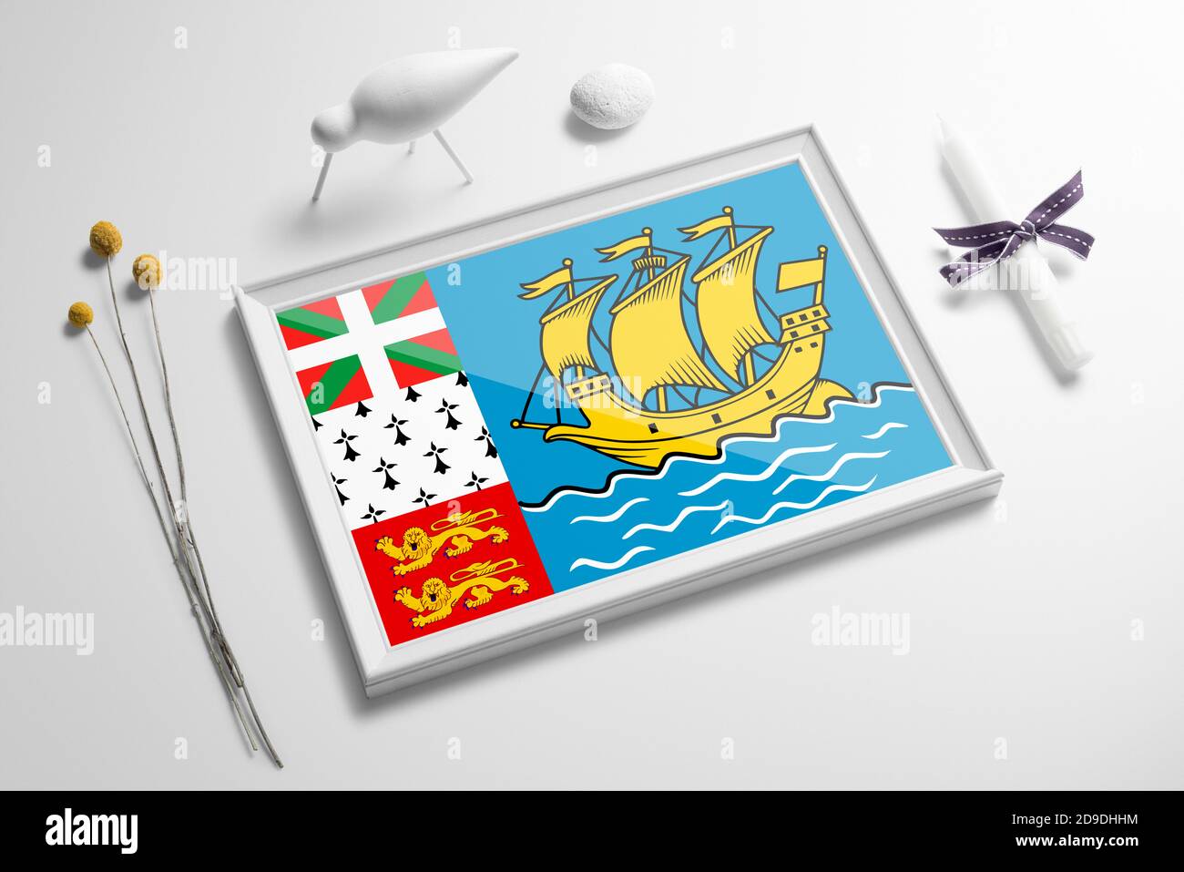 Saint Pierre And Miquelon flag in wooden frame on table. White natural ...