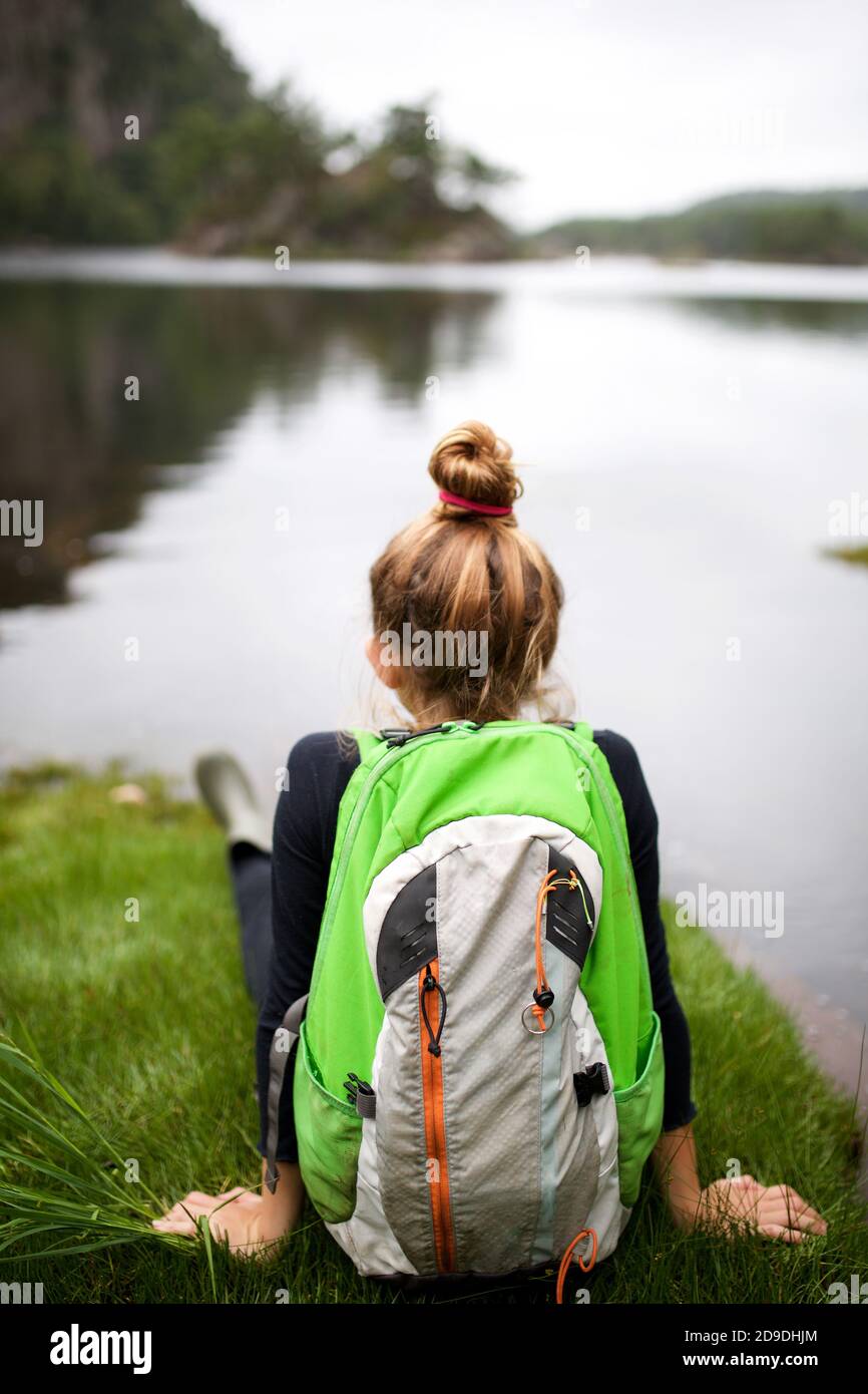 Young girl with backpack hi-res stock photography and images - Alamy