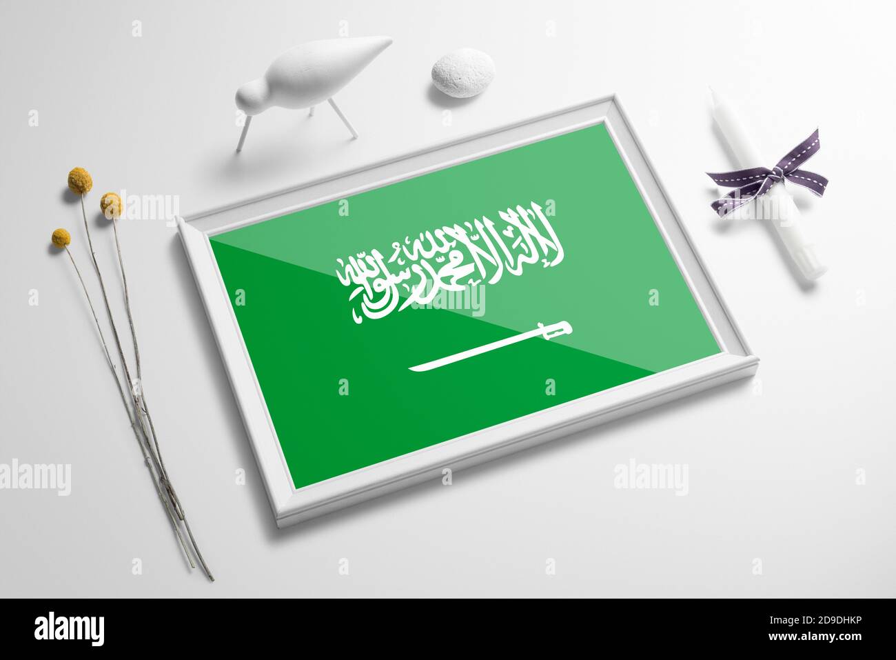 Saudi Arabia flag in wooden frame on table. White natural soft concept ...