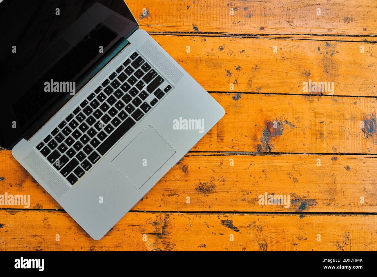 Top view of laptop computer on office table background wooden desk ...