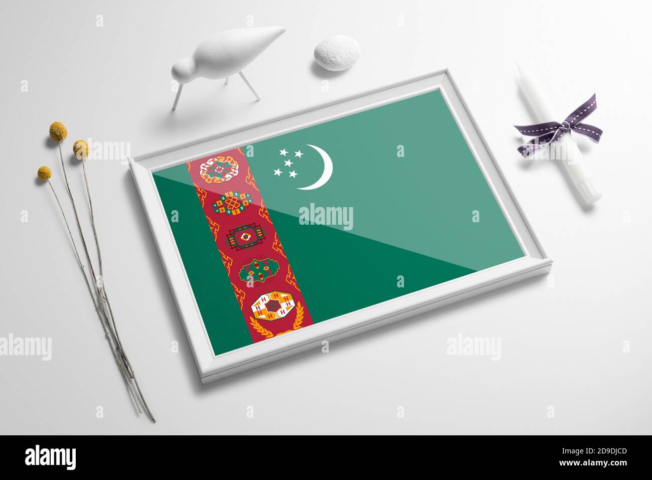 Turkmenistan flag in wooden frame on table. White natural soft concept ...