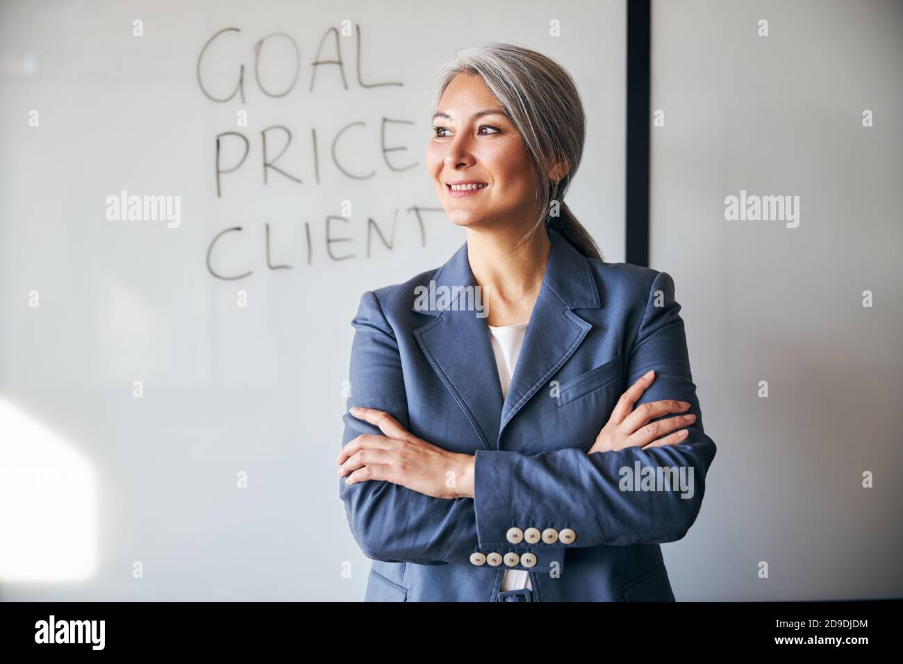 Beautiful businesswoman standing whiteboard hi-res stock photography ...