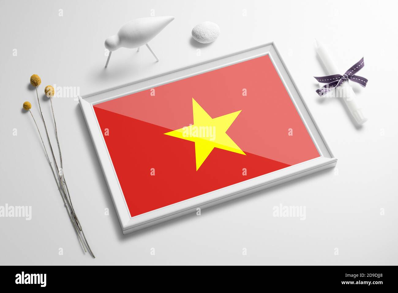 Vietnam flag in wooden frame on table. White natural soft concept ...