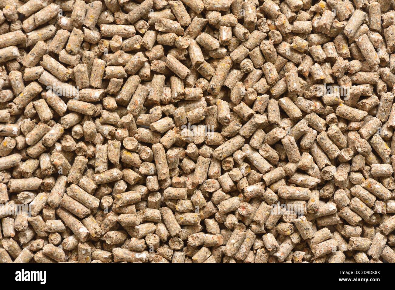 Compressed and balanced animal feed full frame coverage Stock Photo - Alamy