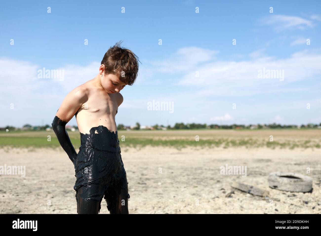 Boy covered mud hi-res stock photography and images - Alamy
