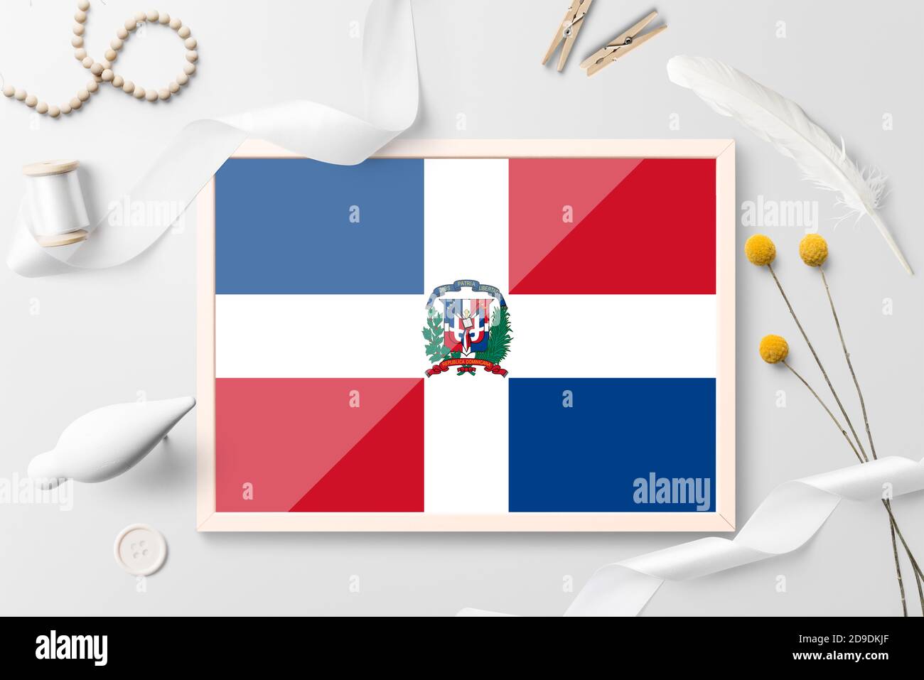 Dominican Republic flag in wooden frame on white creative background ...
