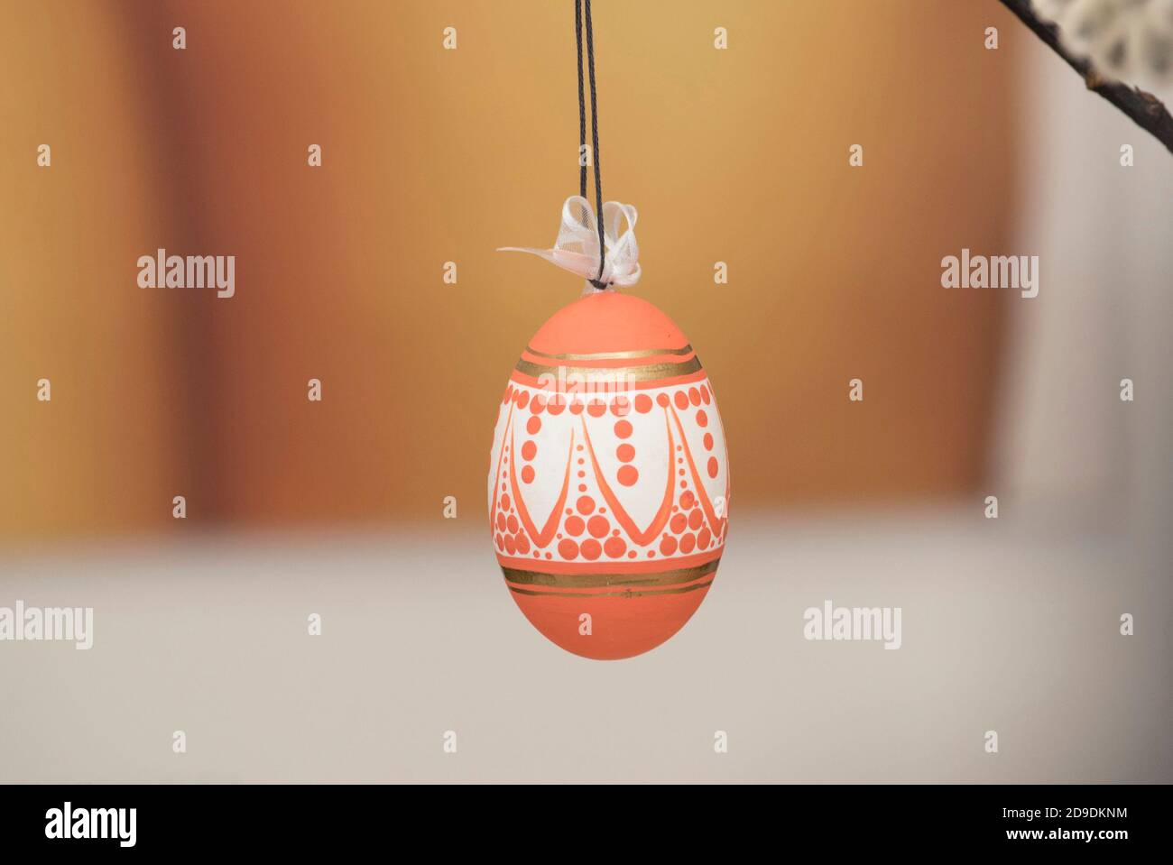 easter egg hanging on thread Stock Photo - Alamy