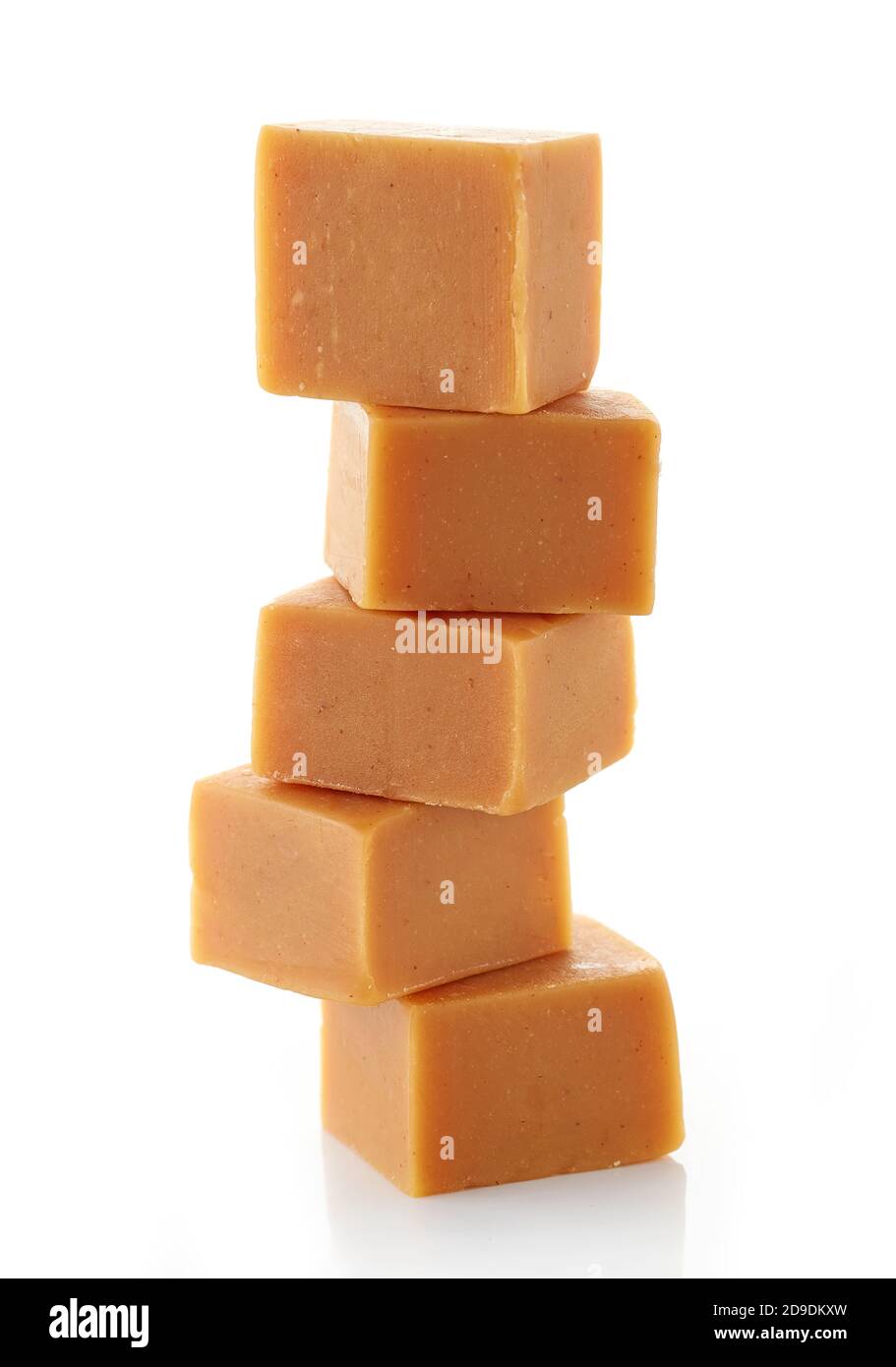 stack of caramel candies isolated on white background Stock Photo - Alamy