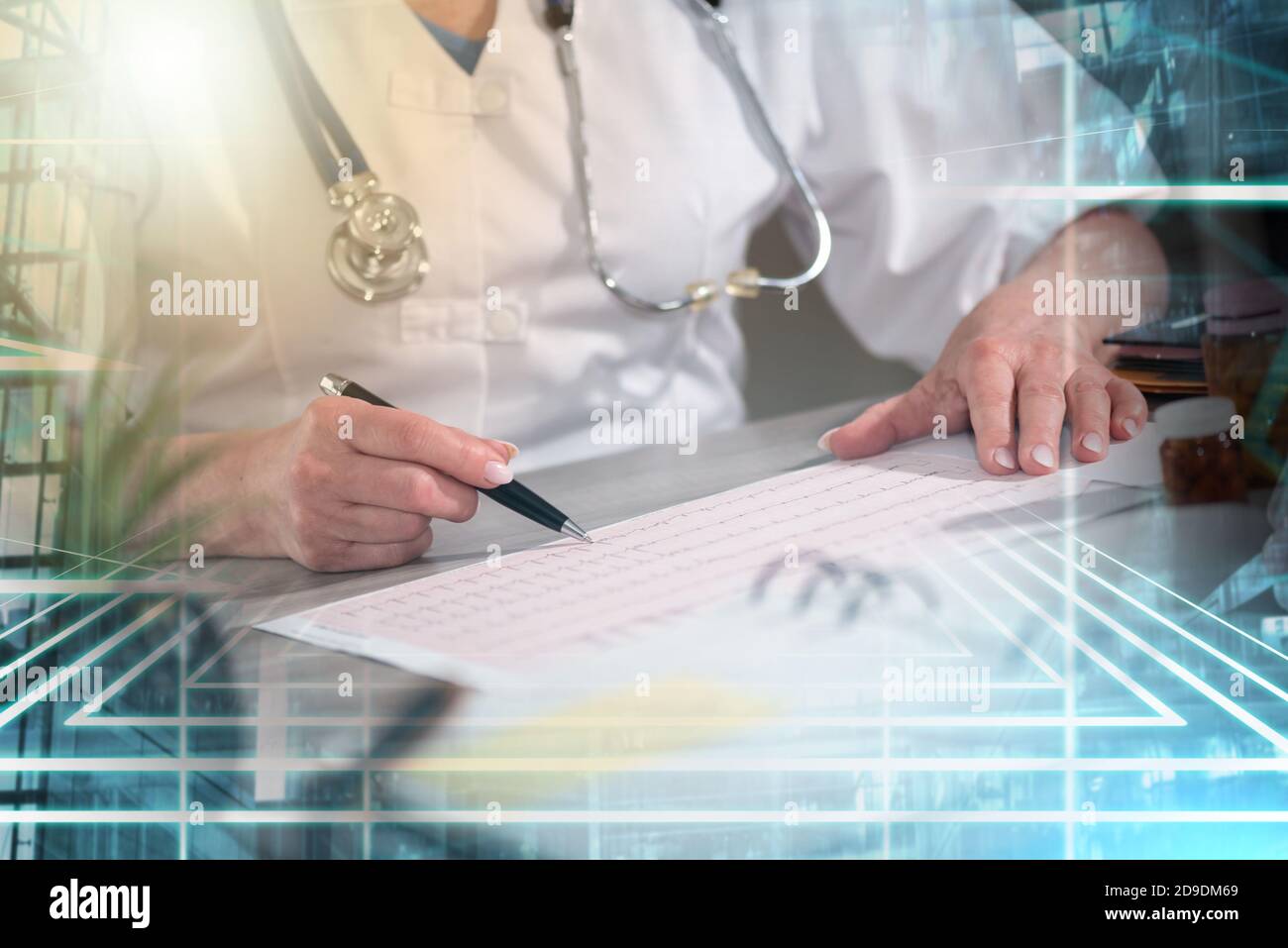 Female cardiologist examining an ecg graph in medical office; multiple ...
