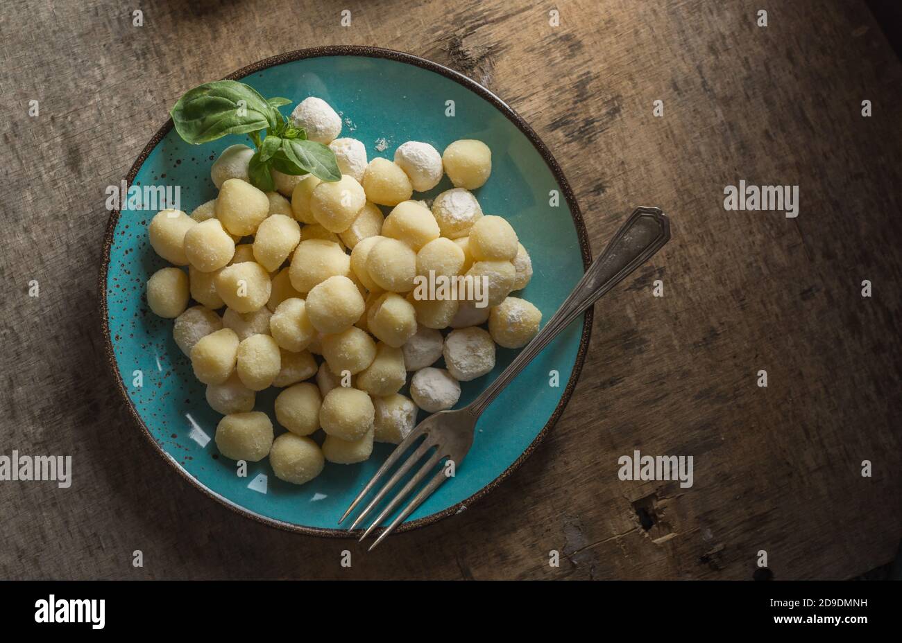 Raw gnocchi, typical Italian made of potato, flour and egg dish ...