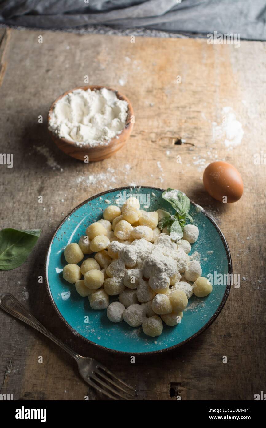 Raw gnocchi, typical Italian made of potato, flour and egg dish ...