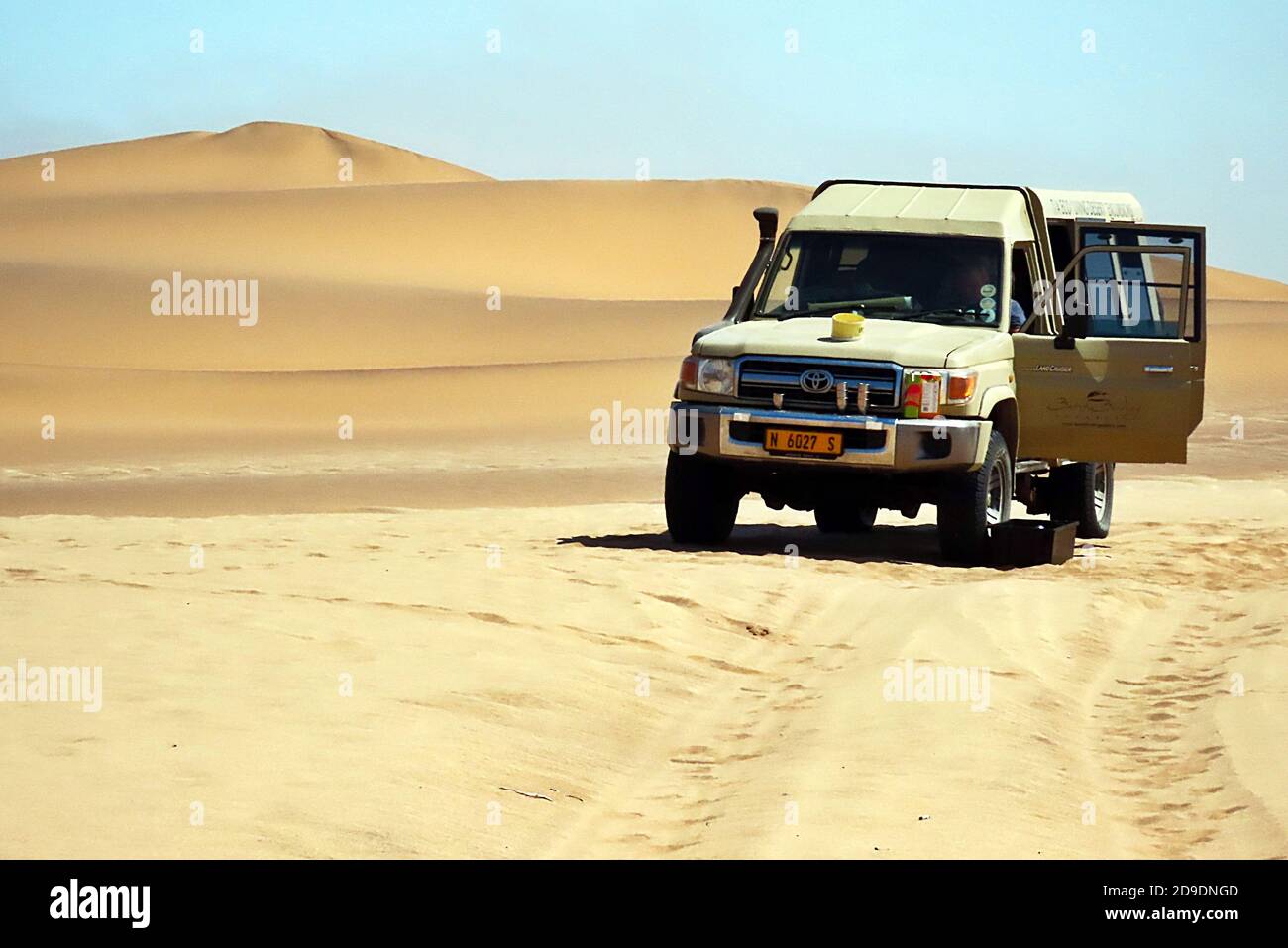 Off road driving in the desert sand dunes of the Dorob National Park on ...