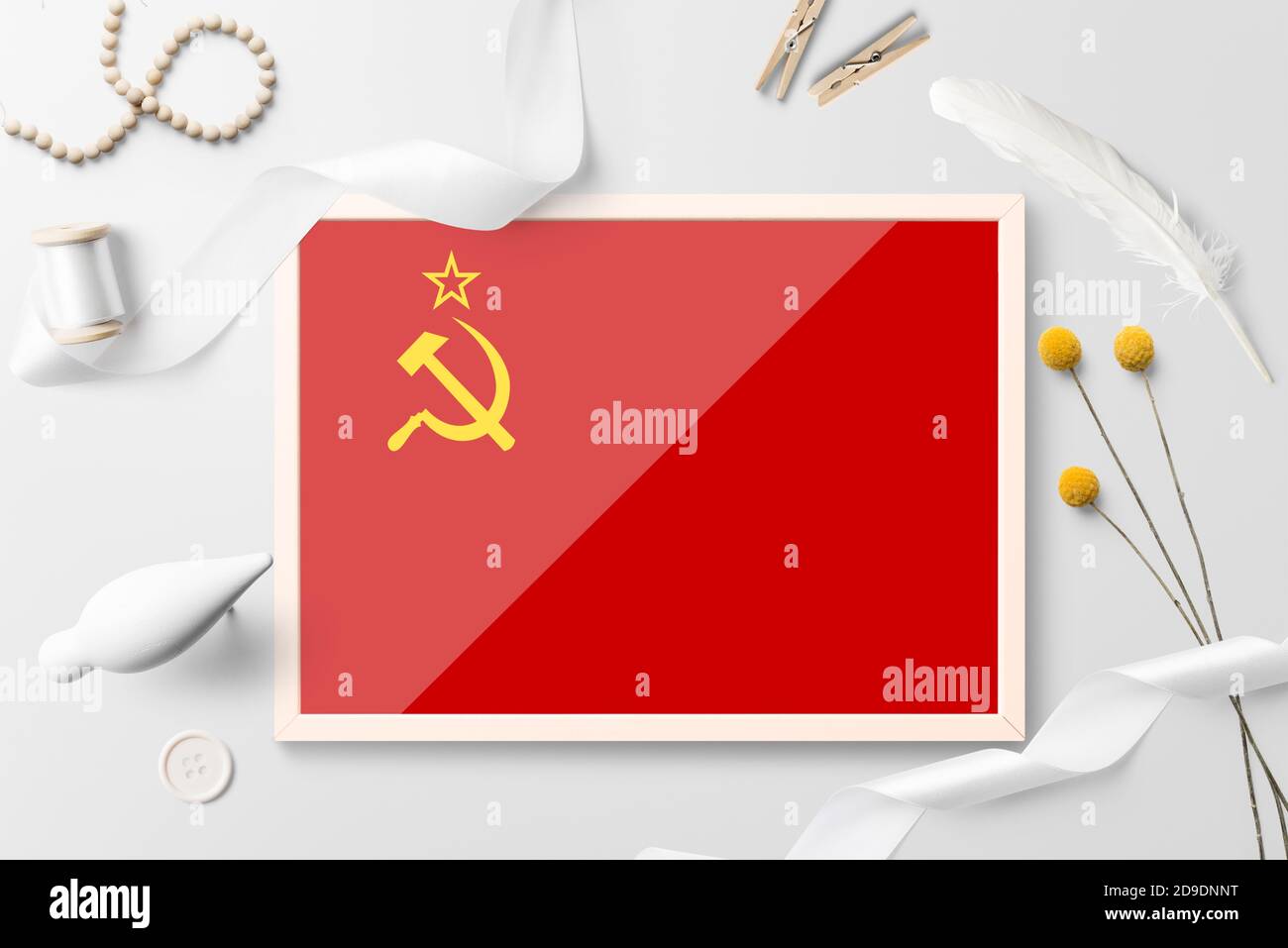 Soviet Union flag in wooden frame on white creative background. White ...