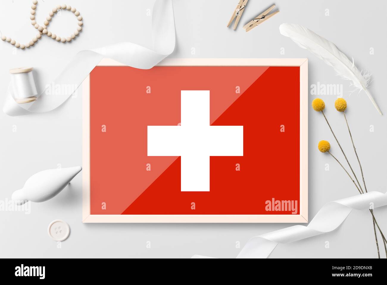 Switzerland flag in wooden frame on white creative background. White ...