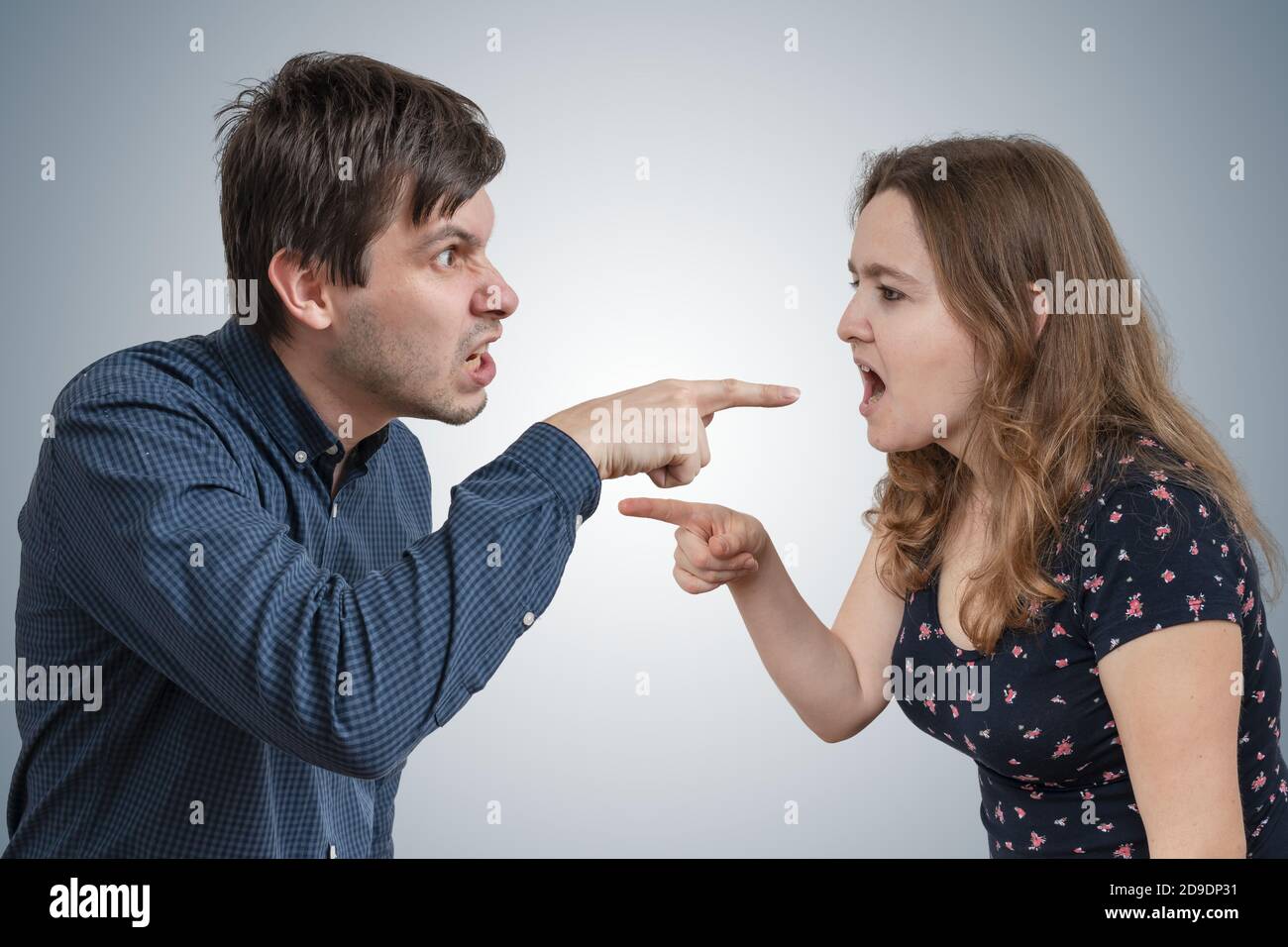 Young couple is arguing and blaming each other Stock Photo - Alamy