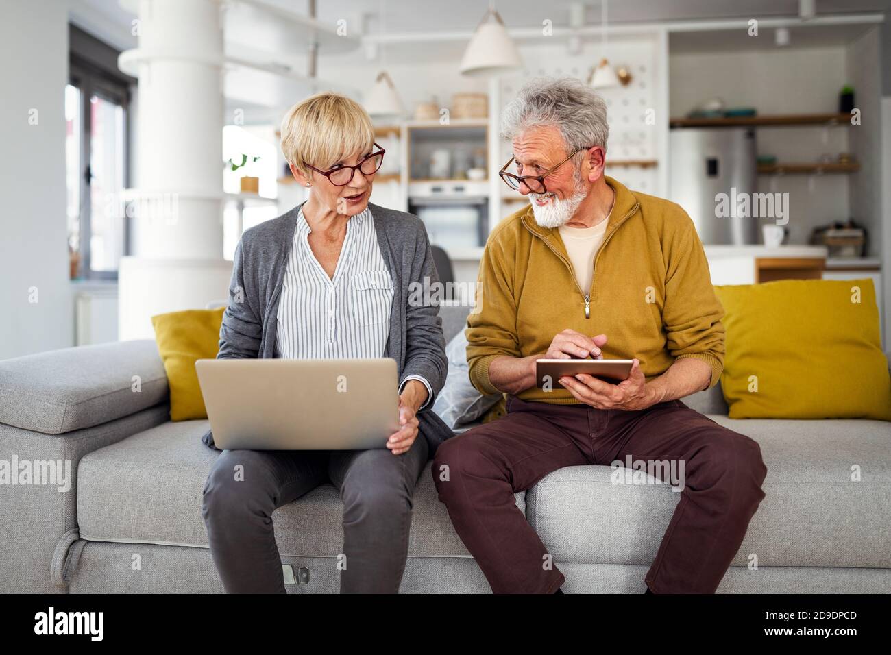 Senior retired couple learn about computer and online support Stock ...