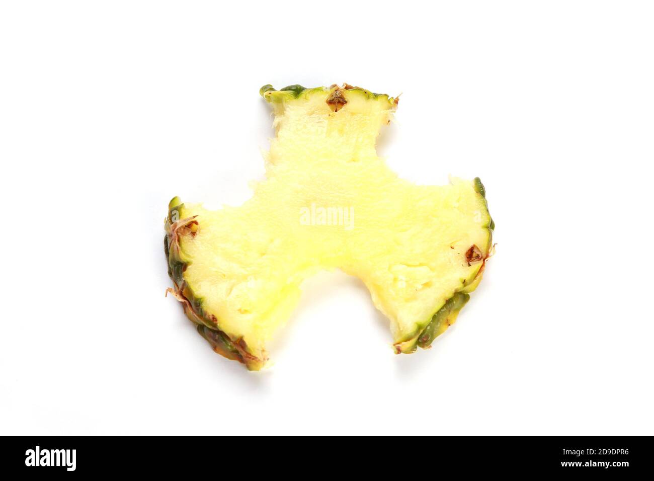 Pineapple slice cut into a star shape isolated on a white background ...