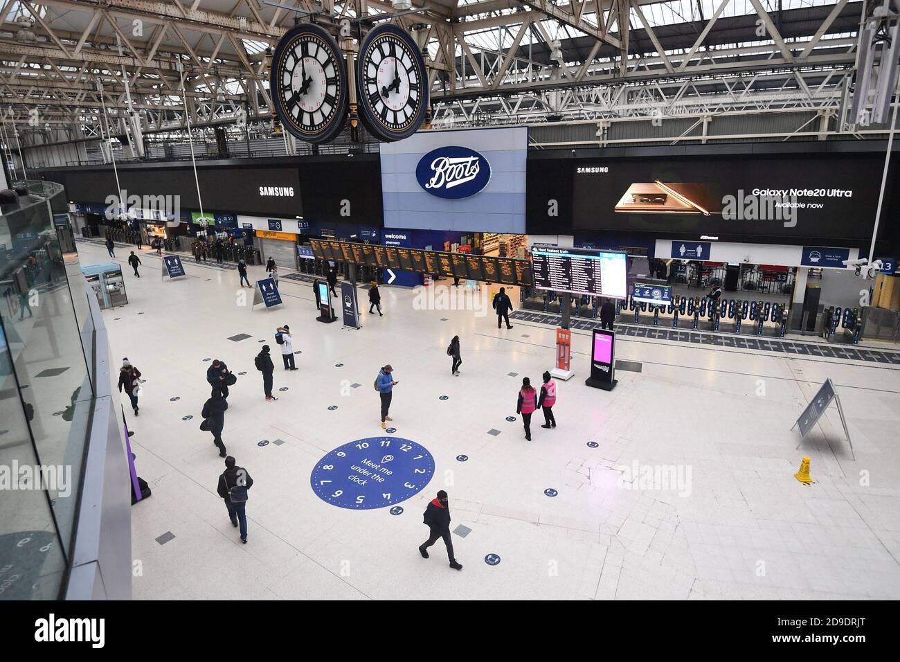 Commuters at Waterloo Station, London, in the morning rush hour at the ...
