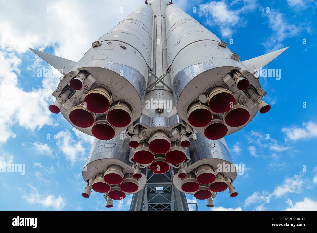 Rocket engine and red nozzle engines on the background of blue sky ...