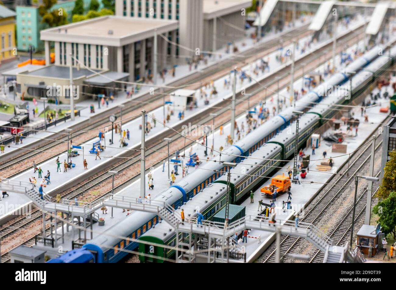 Miniature railway. The platform of the train station. Stand with a ...