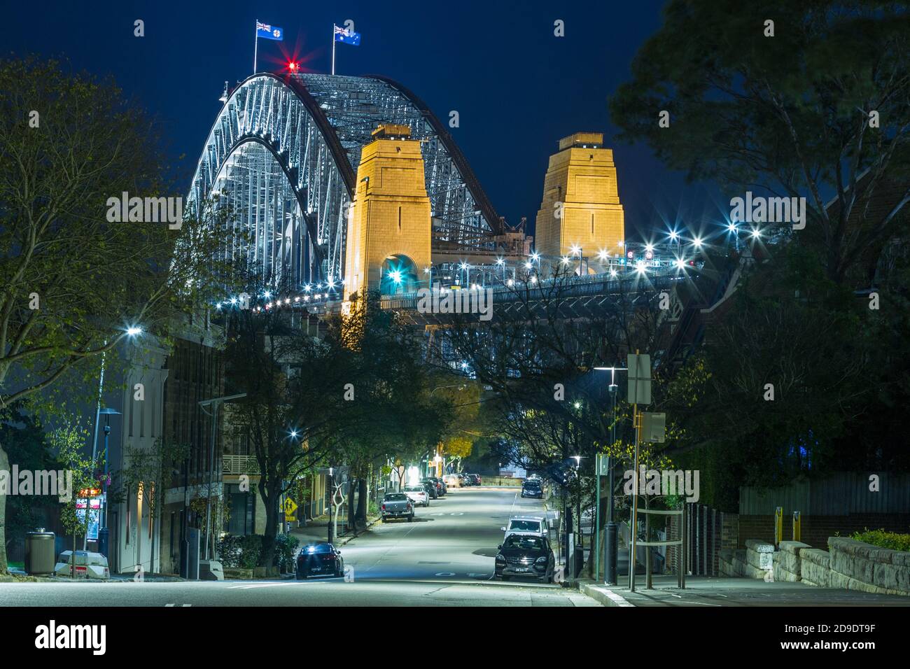 Sydney Harbour Bridge in Sydney, Australia, seen by night along Lower ...