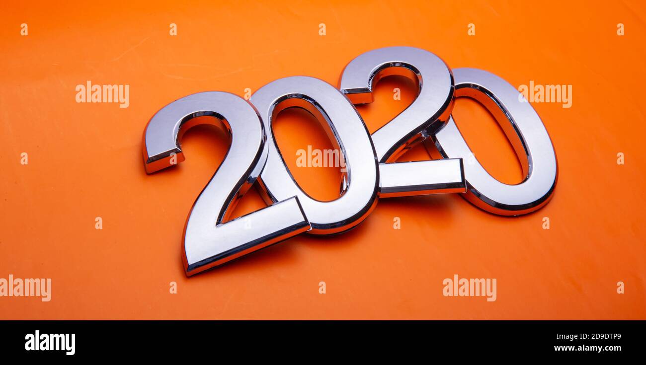 Happy New Year 2020. Symbol from number 2020 on orange background ...