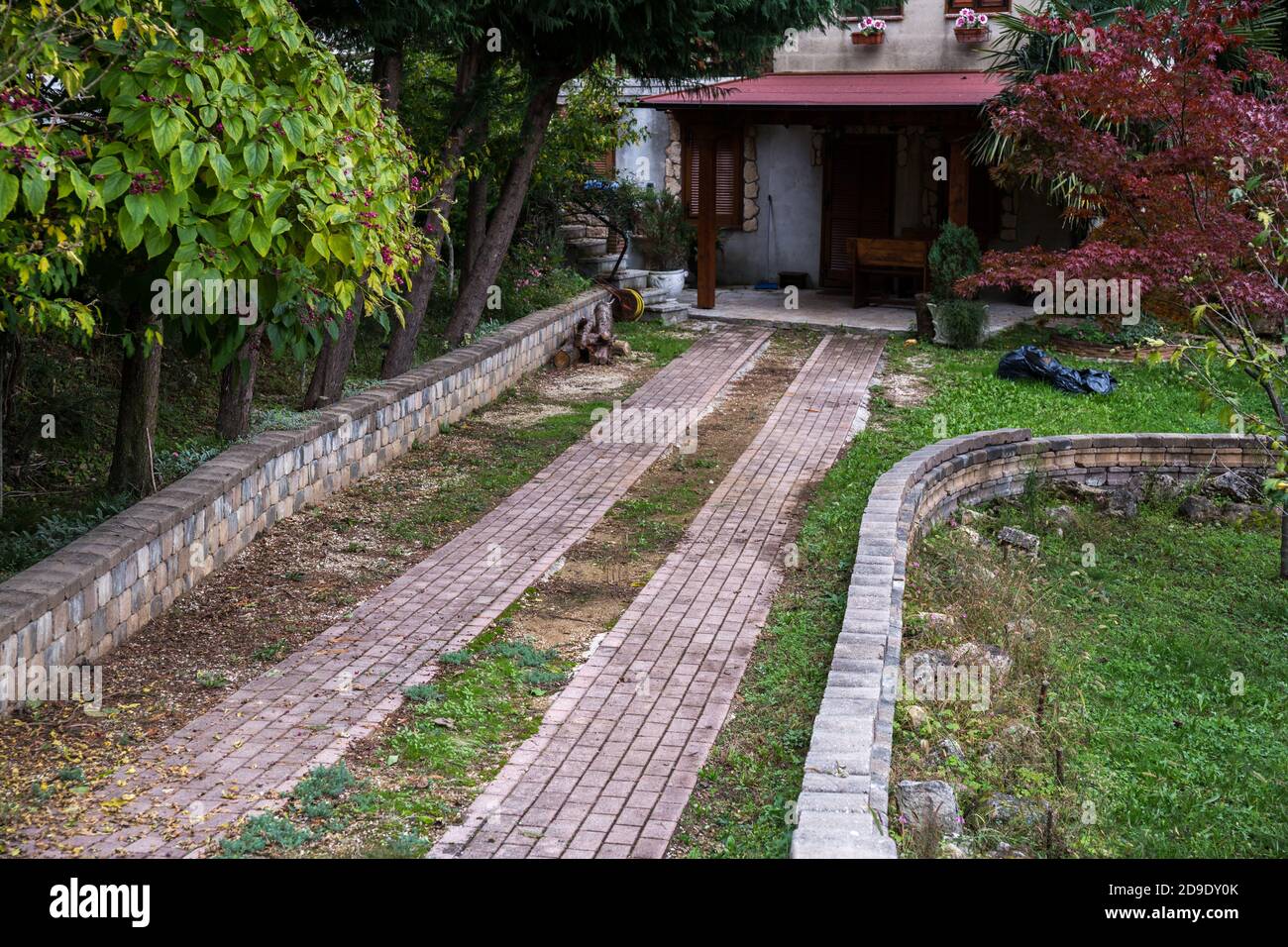 Elegant stone path leading to an entrance of a building Stock Photo - Alamy
