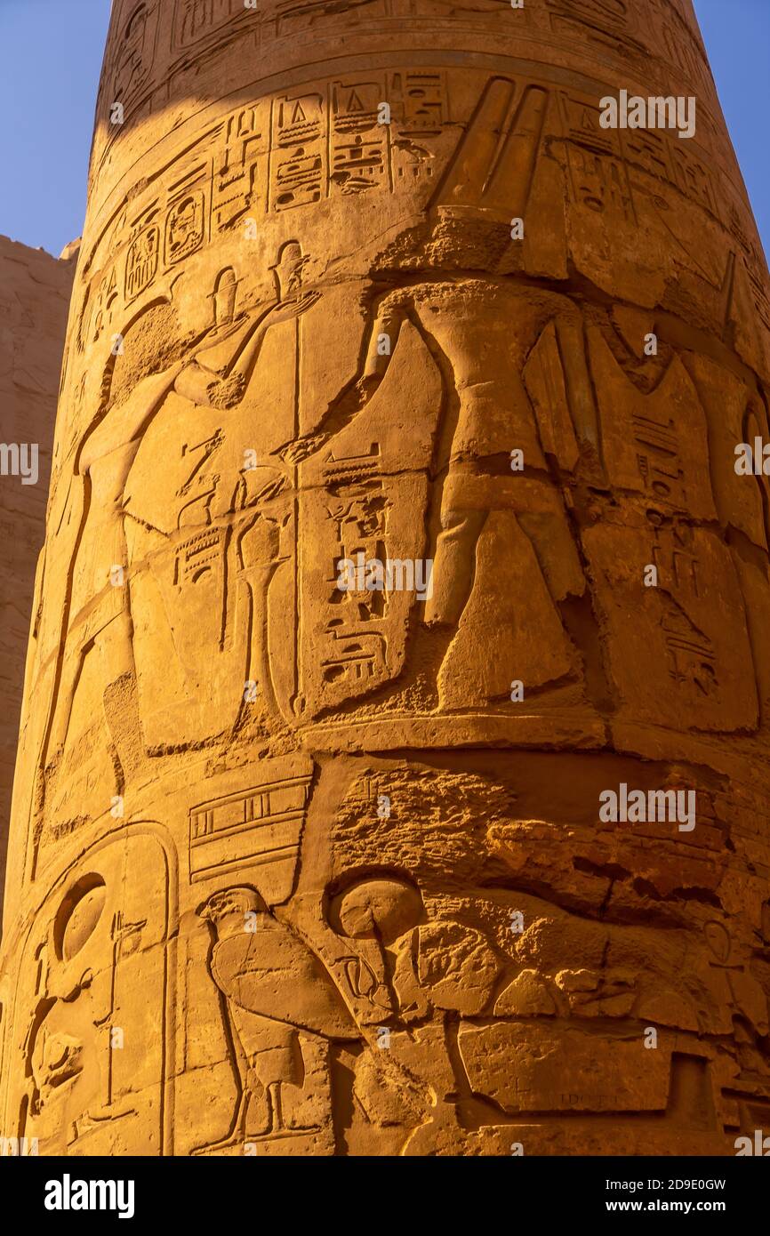 Vertical closeup shot of an ancient Egyptian column with hieroglyphs ...