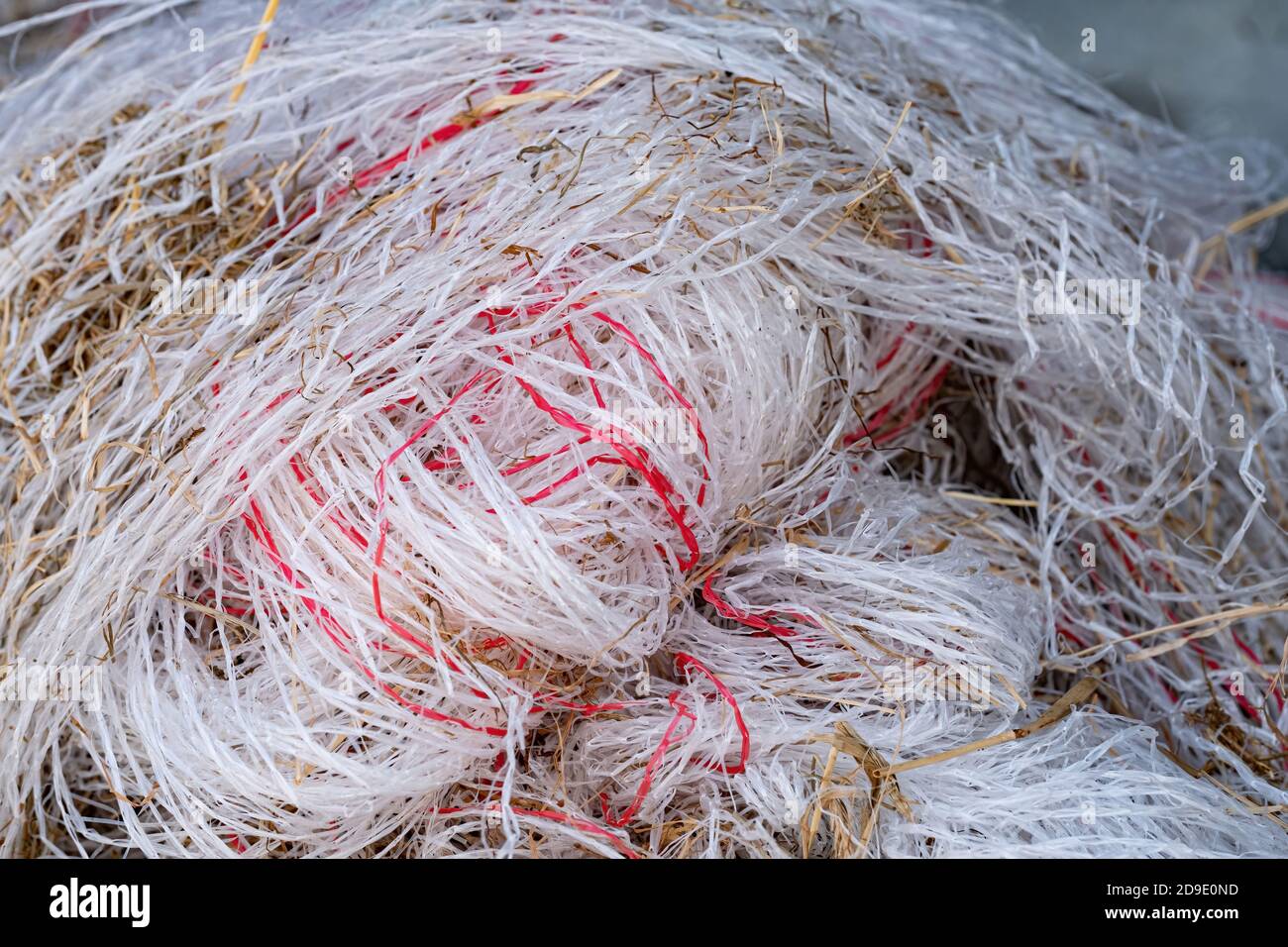 Pile of garbage, plastic threads of packing material in a large pile ...