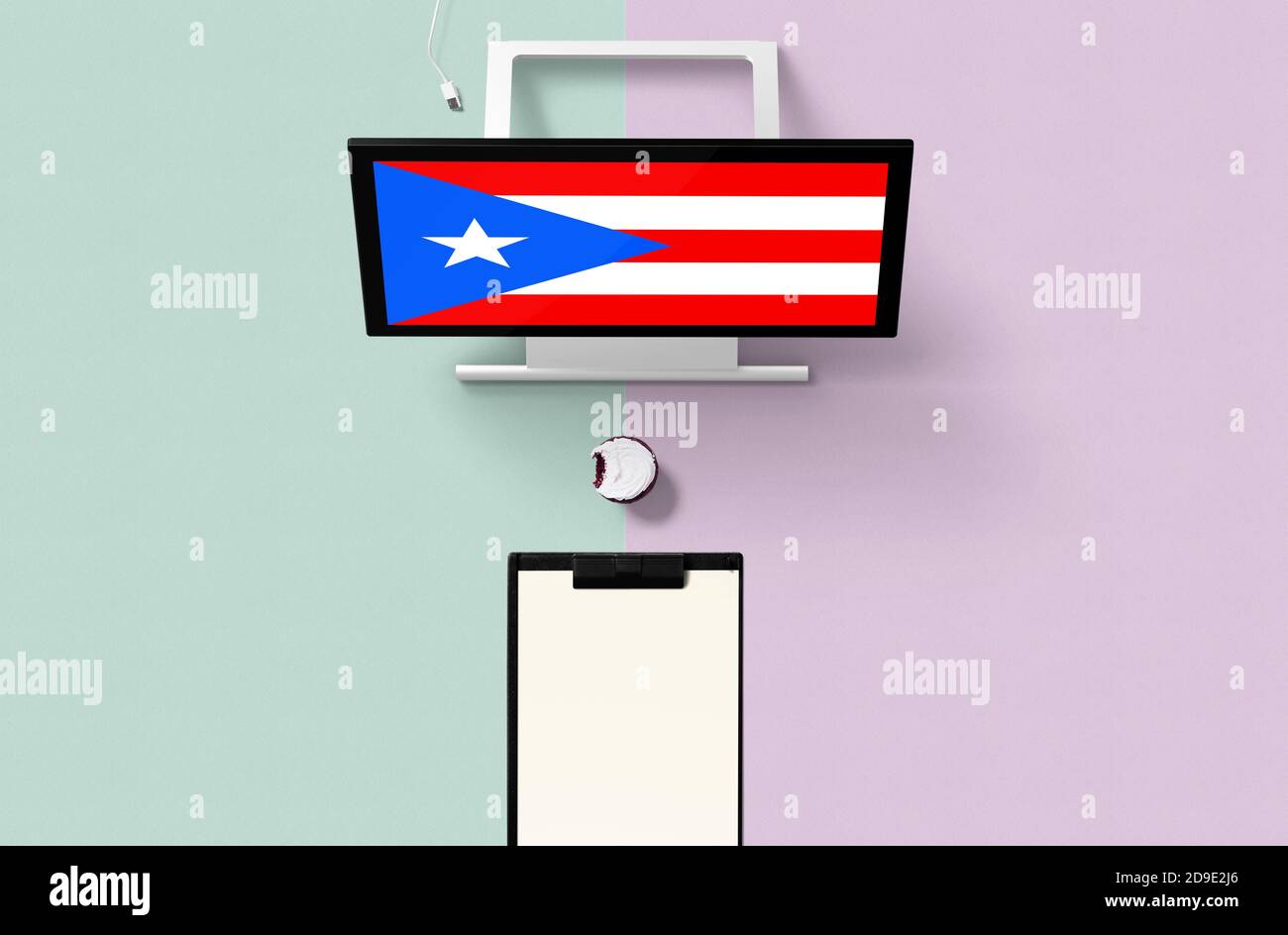 Puerto Rico national flag on computer screen top view, cupcake and ...