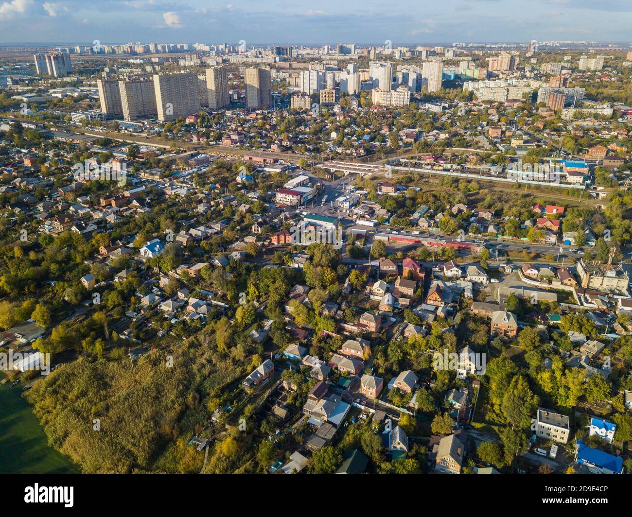 Aerial view of city. Big and small houses in town Stock Photo - Alamy