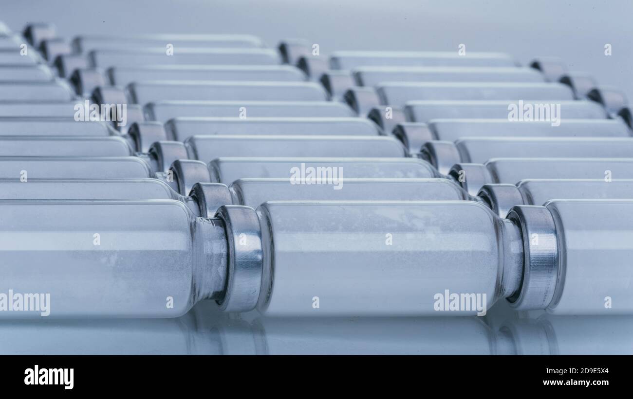 Glass medical ampoule vial for injection. Medicine is dry white drug ...