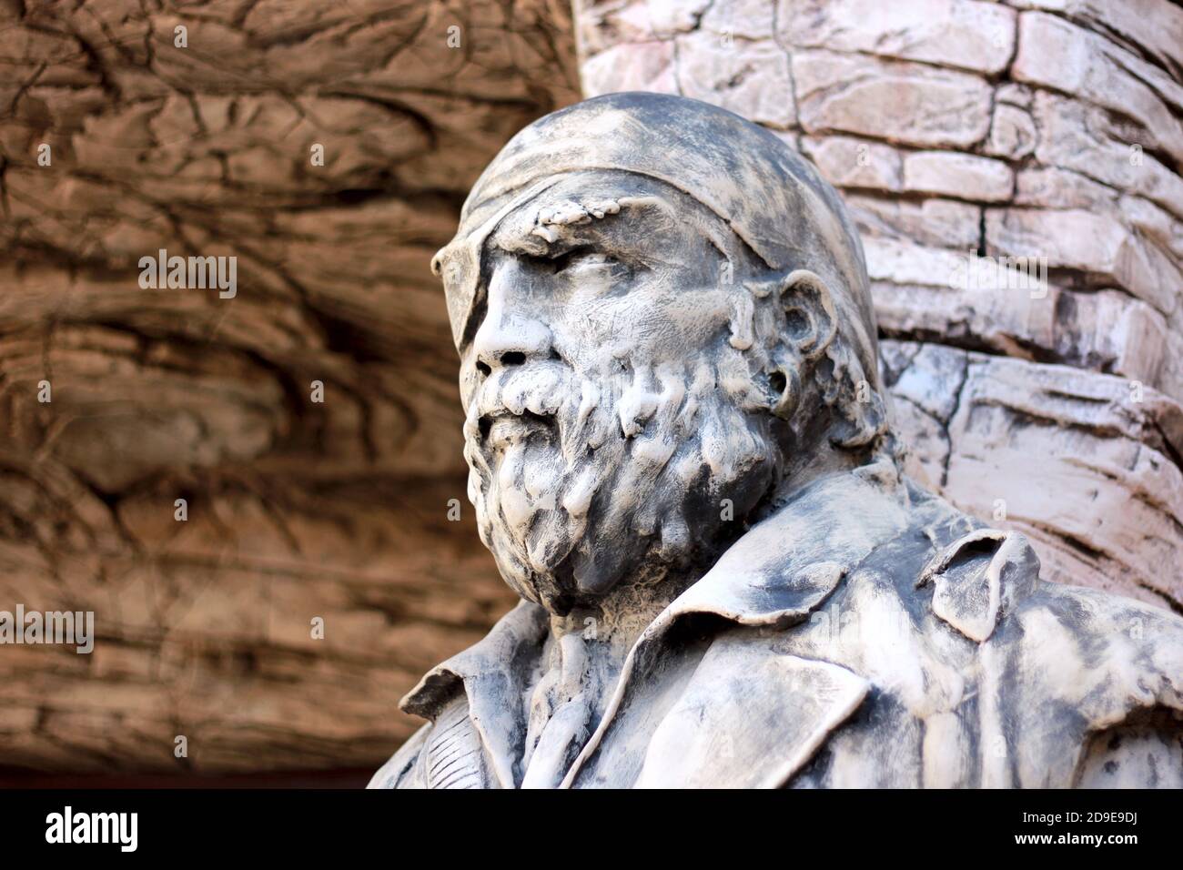 stone statue of a pirate on the building Stock Photo - Alamy