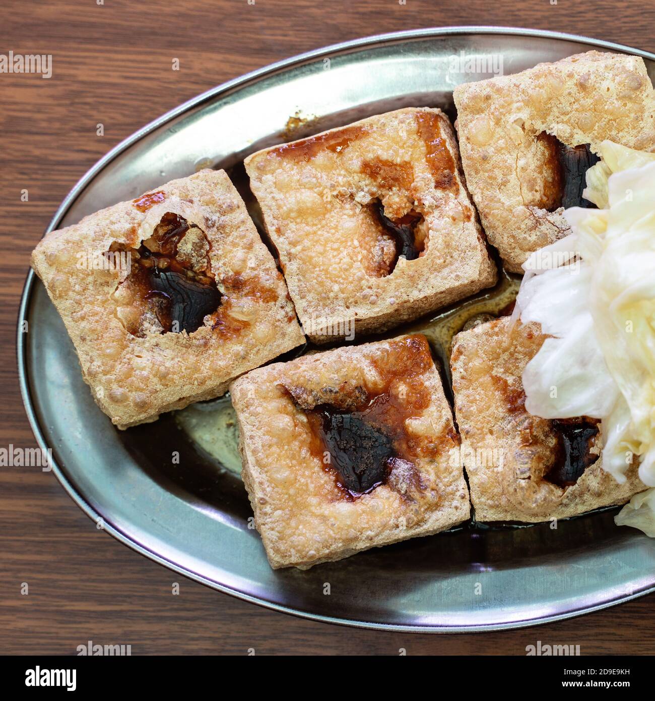 Deep fried stinky tofu, fermented bean curd with pickled cabbage ...