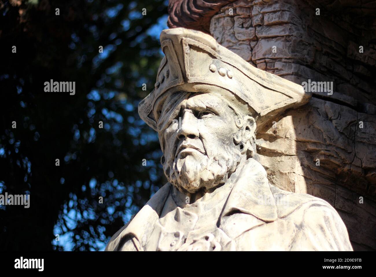 stone statue of a pirate on the building Stock Photo - Alamy